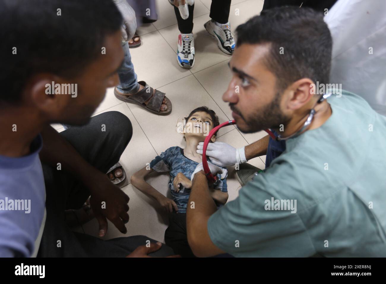 Relatives of the Palestinians died in Israeli attacks, mourn as they ...