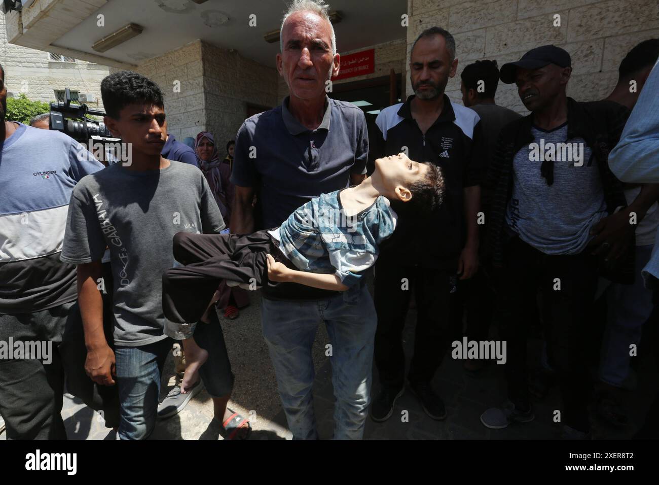 Relatives of the Palestinians died in Israeli attacks, mourn as they ...