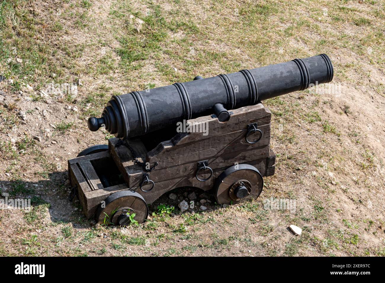 Medieval old cannon on a wooden pedestal from above Stock Photo - Alamy
