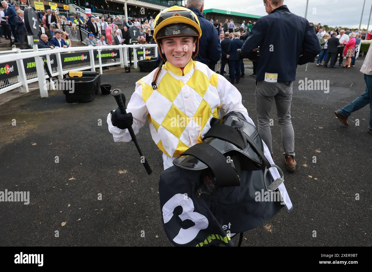 Hollie Doyle celebrates winning aboard Alphonse Le Grande during the ...