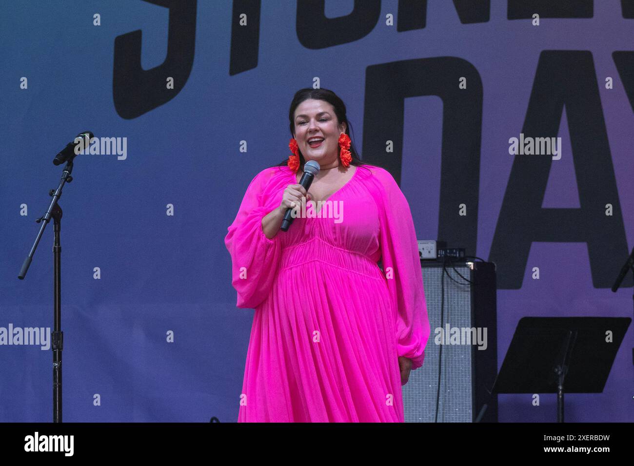 Courtney Maywald speaks on stage Stonewall Day 2024 in the Public ...