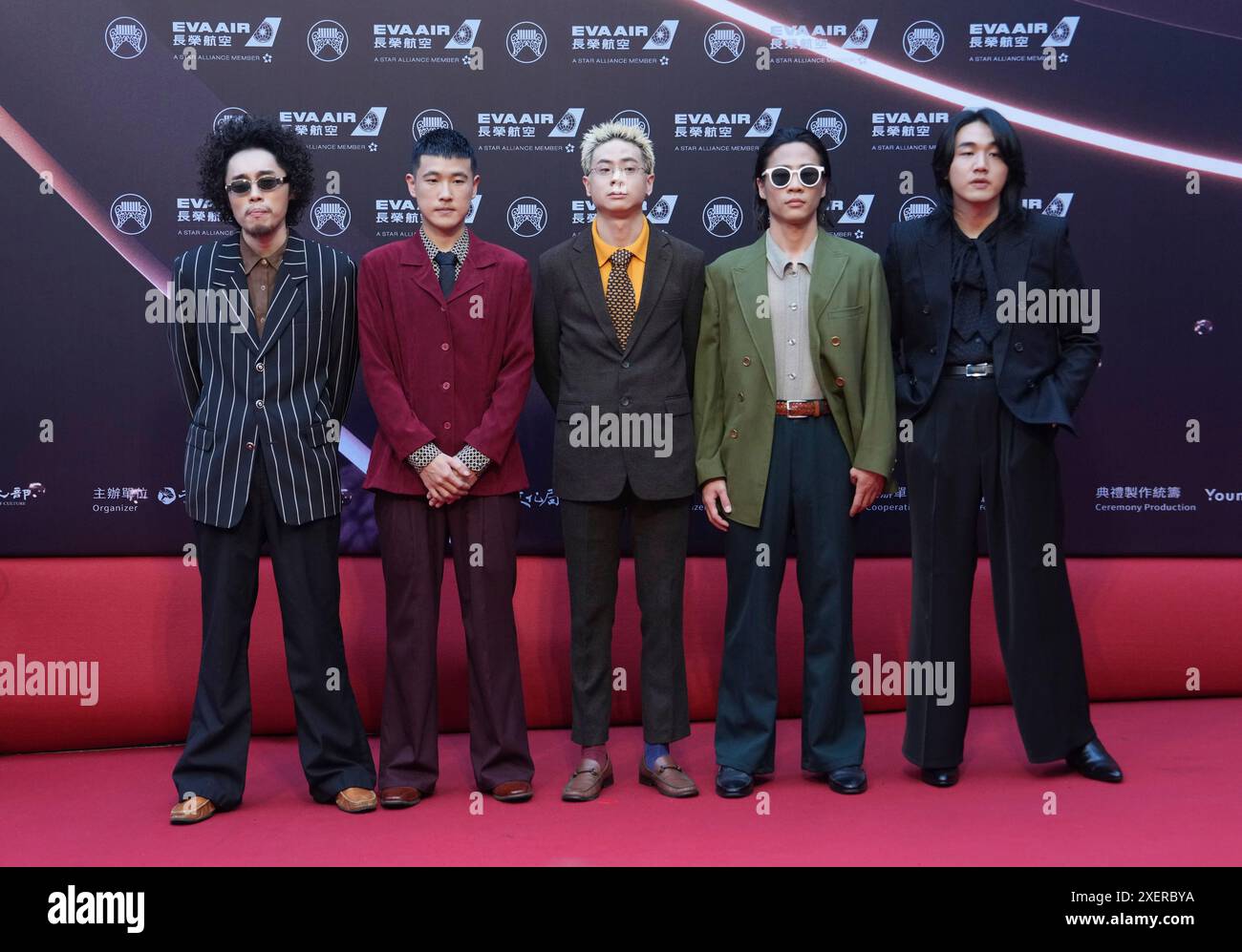 Taiwanese POP group The Loophole pose for a photo as they arrive for ...
