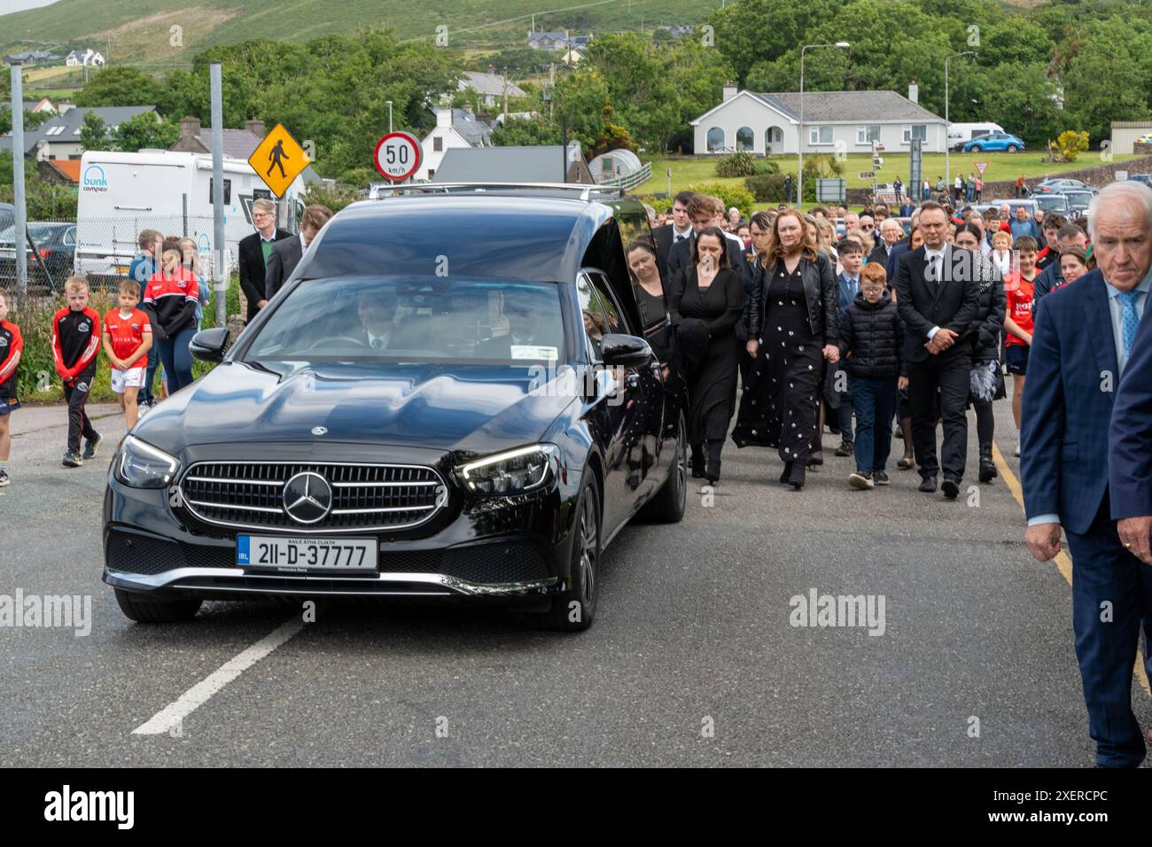 RETRANSMITTED CORRECTING CAPTION The hearse carrying renowned Gaelic ...