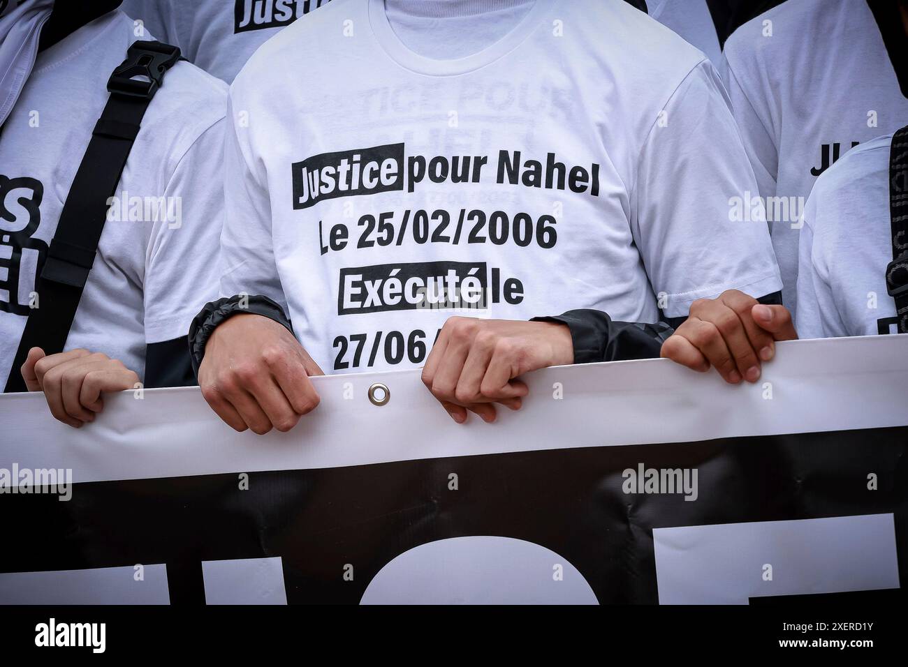 A protestor wears a t-shirt that reads: "Justice for Nahel" during a ...