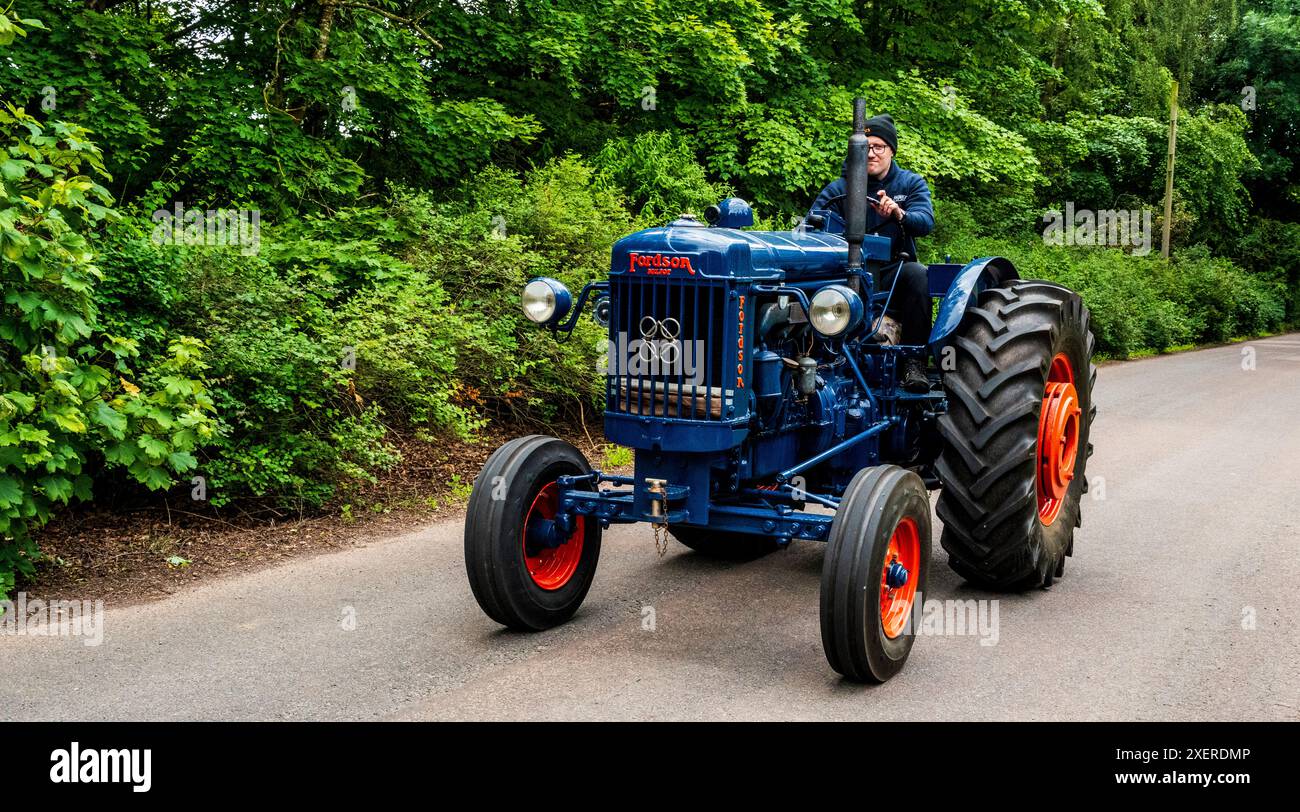 Tractors taking part in a fun charity rally on country roads in South ...