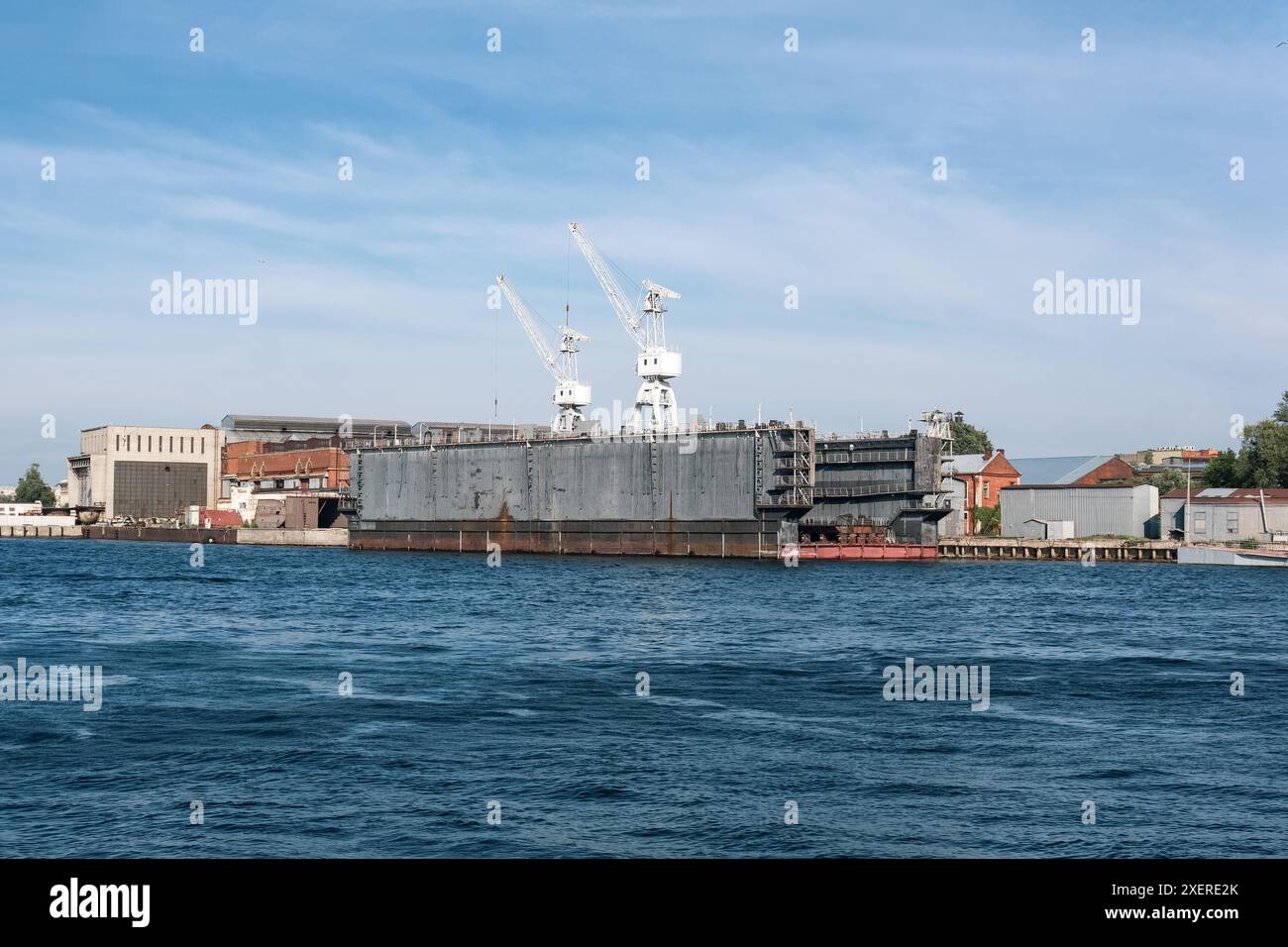 floating dock against the backdrop of a shipyard Stock Photo - Alamy