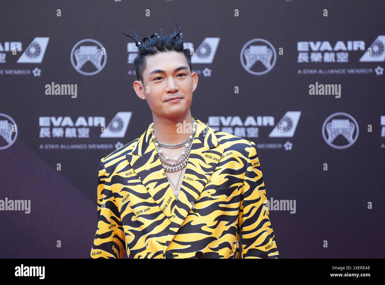 Taiwanese singer AZ Hsiao-Tzu Lee poses for a photo as he arrives for the 35th Golden Melody ...