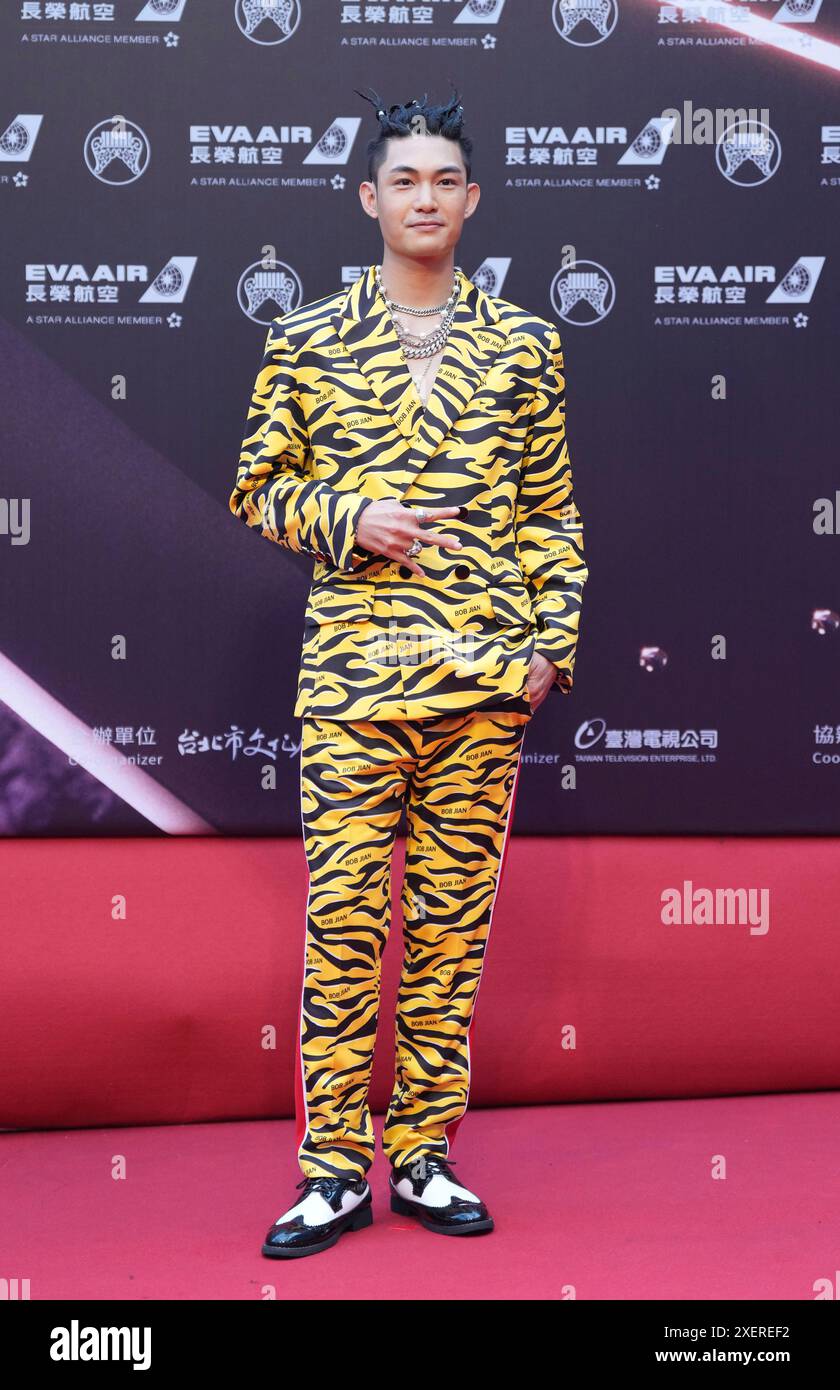 Taiwanese singer AZ Hsiao-Tzu Lee poses for a photo as he arrives for the 35th Golden Melody ...
