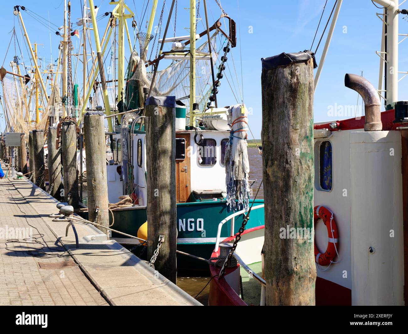 Shrimp cutters with fishing nets in Greetsiel harbour, ready for the ...