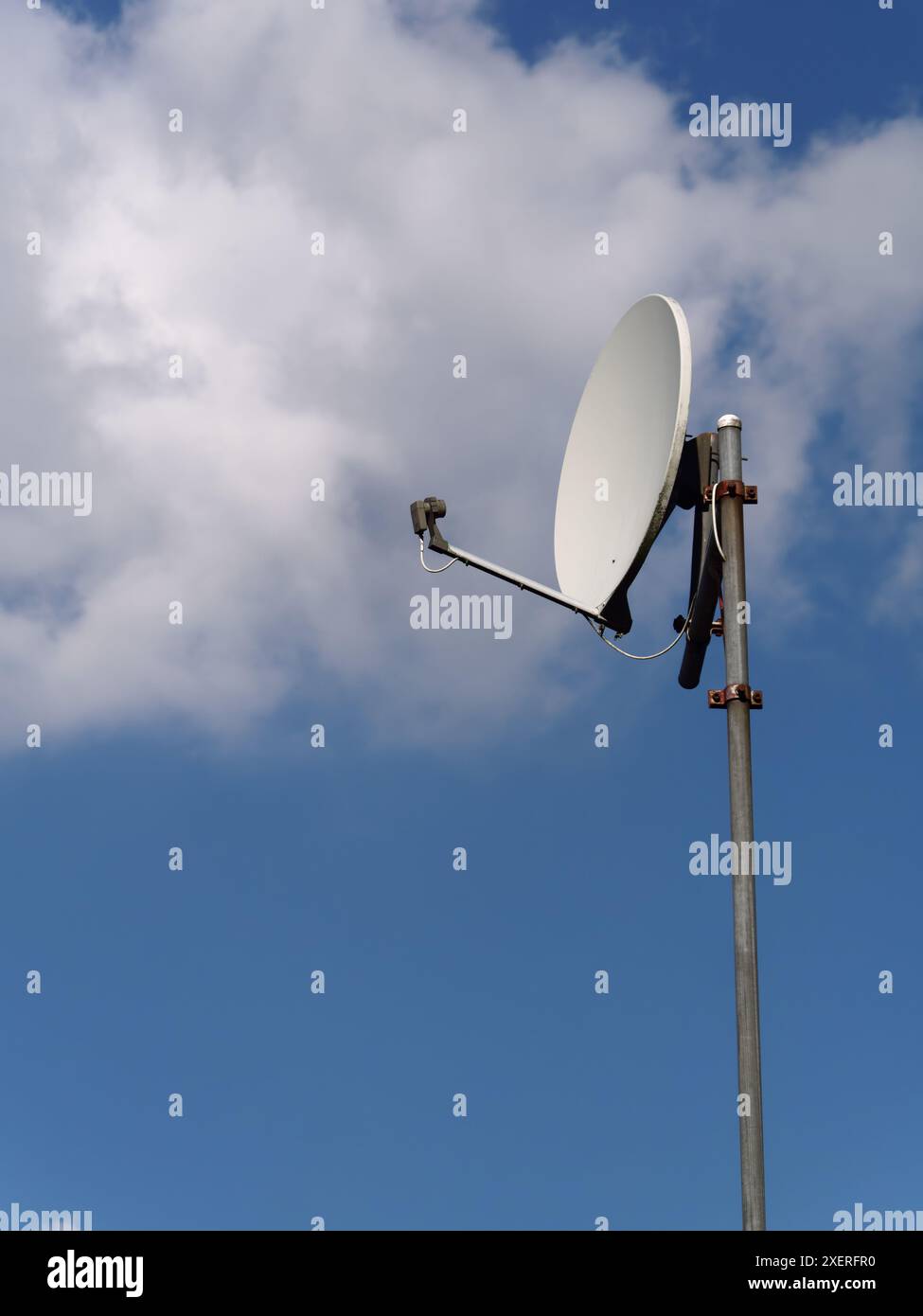 Closeup view of a home satellite dish on a long tube Stock Photo - Alamy