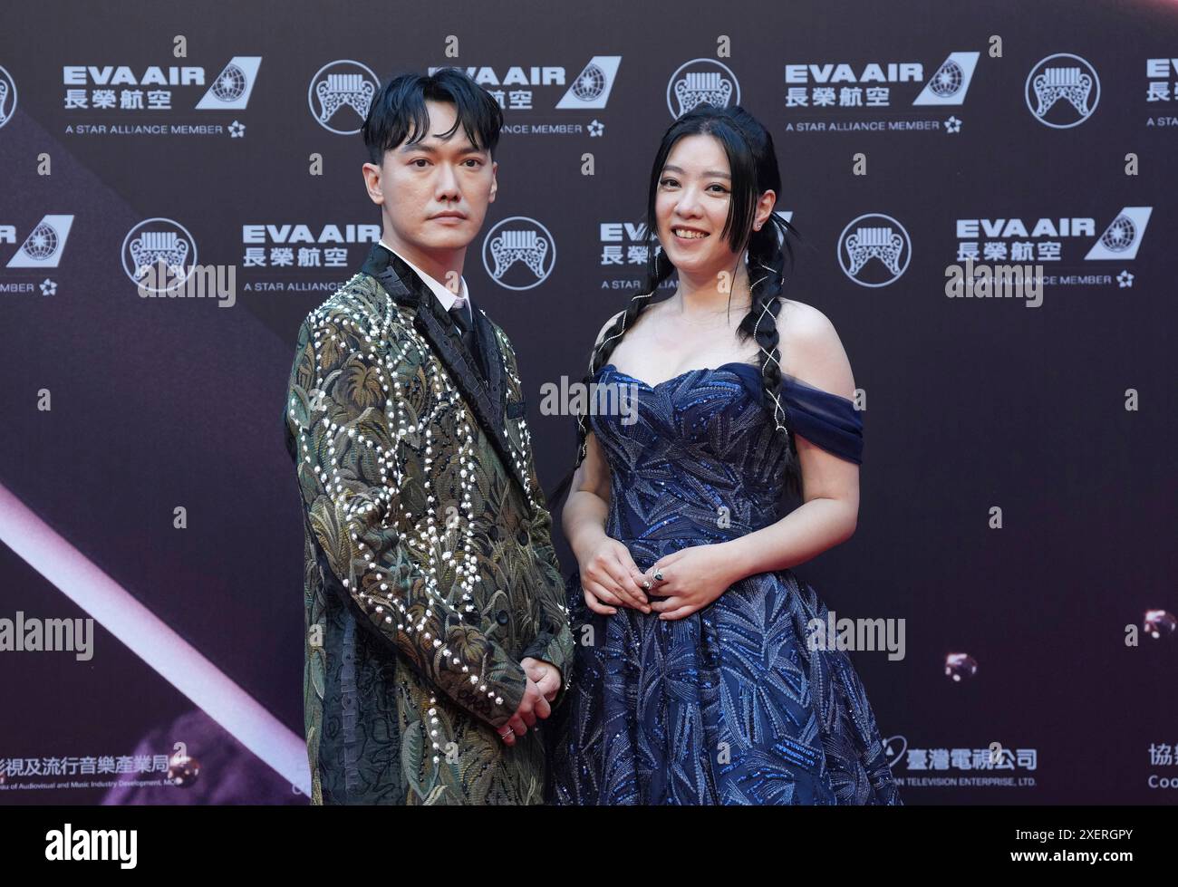Taiwanese POP group Limi pose for a photo as they arrive for the 35th ...