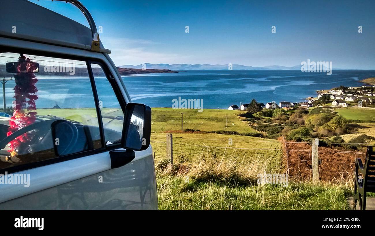 Campervan parked up in a car park with a stunnign view across Gairloch ...