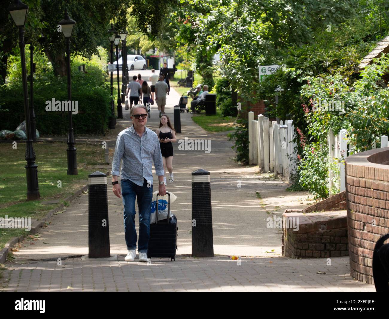 Pedestrians in Green Walk near Station Road, North Chingford, London ...