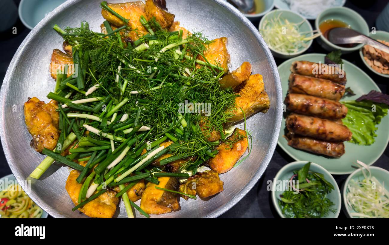 A dish of boneless grilled hemibagrus fish, a type of river catfish ...