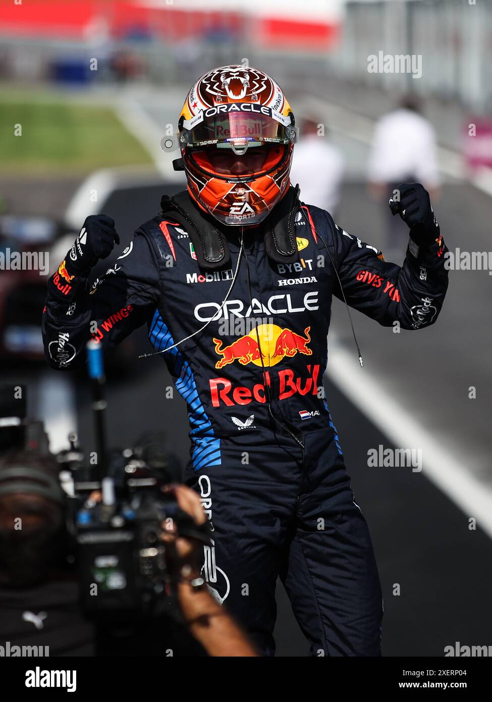 VERSTAPPEN Max (ned), Red Bull Racing RB20, portrait celebrates pole ...