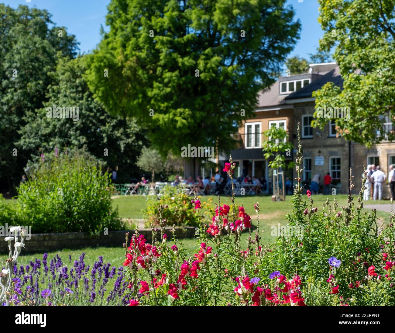 Sunny day at Pinner Memorial Park, showing flowers and lake in the ...