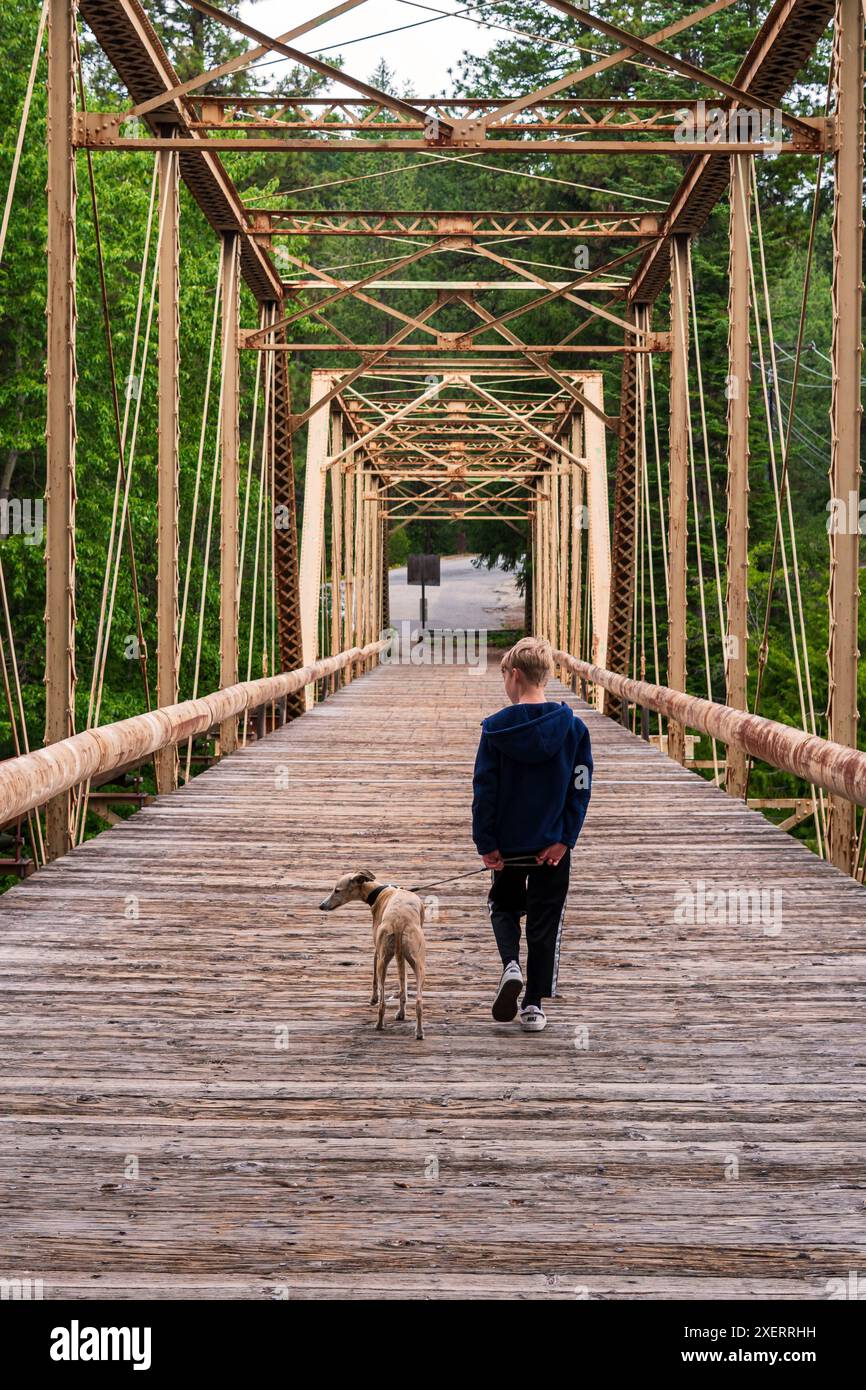 Boy and Dog on the Footbridge at Plain, Washington, USA Stock Photo - Alamy