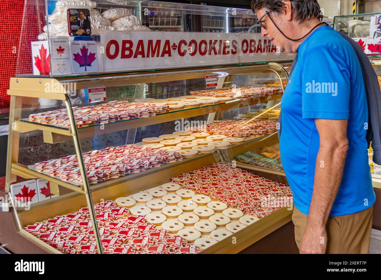 Ottawa, ON, Canada-June 12, 2024: Man looking at display of Obama ...