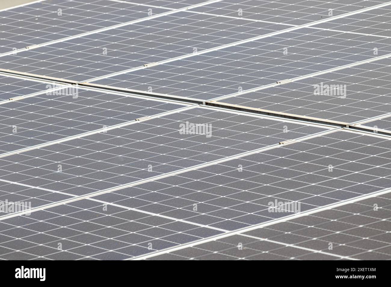 Photovoltaic panels on the roof. View of solar panels in a house on the ...