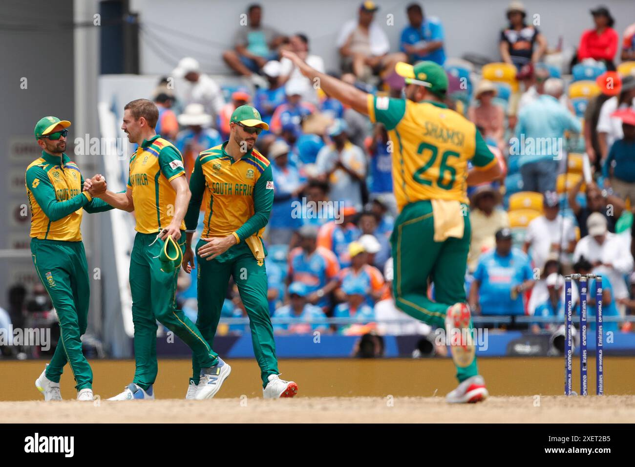 South Africa's Anrich Nortje celebrates the wicket of India's Ravindra ...