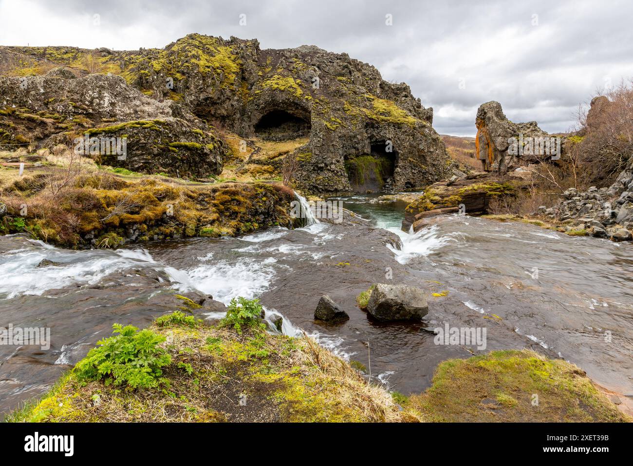 Gjain Canyon landscape with small waterfalls, lush vegetation and ...