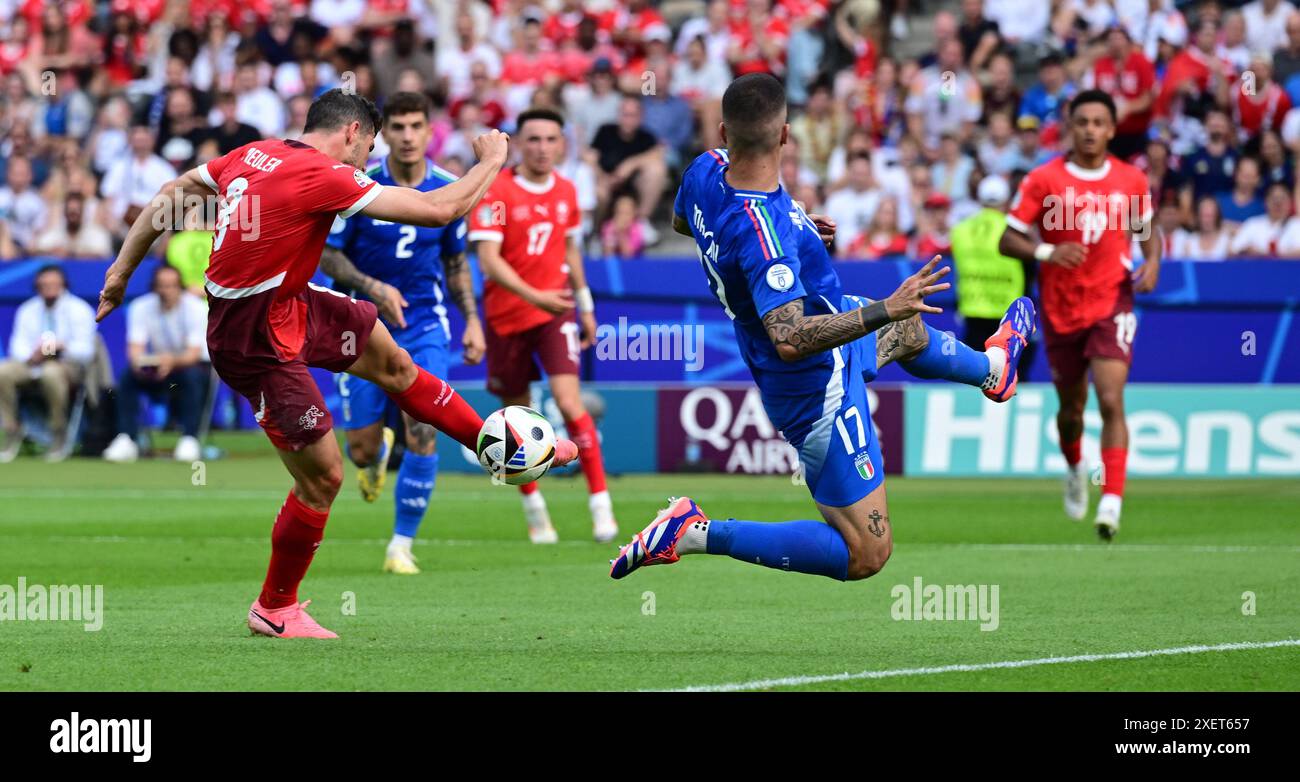 Berlin, Germany. 29th June, 2024. Remo Freuler of Switzerland scores ...