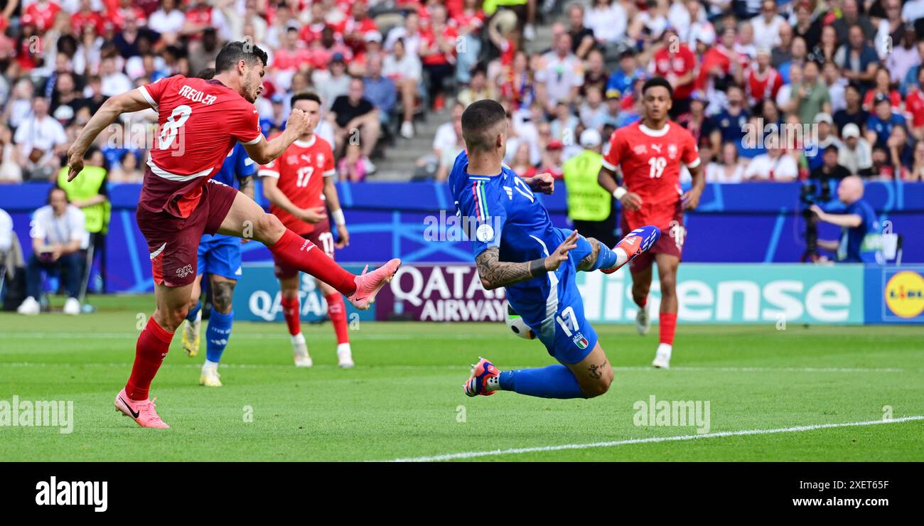 Berlin, Germany. 29th June, 2024. Remo Freuler of Switzerland scores ...