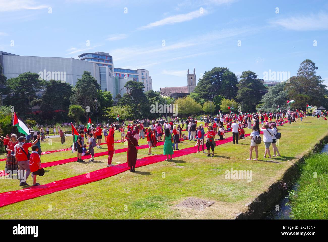 Over 500 people held and carried the peoples red line in Bournemouth June 29 2024. Holding a ...
