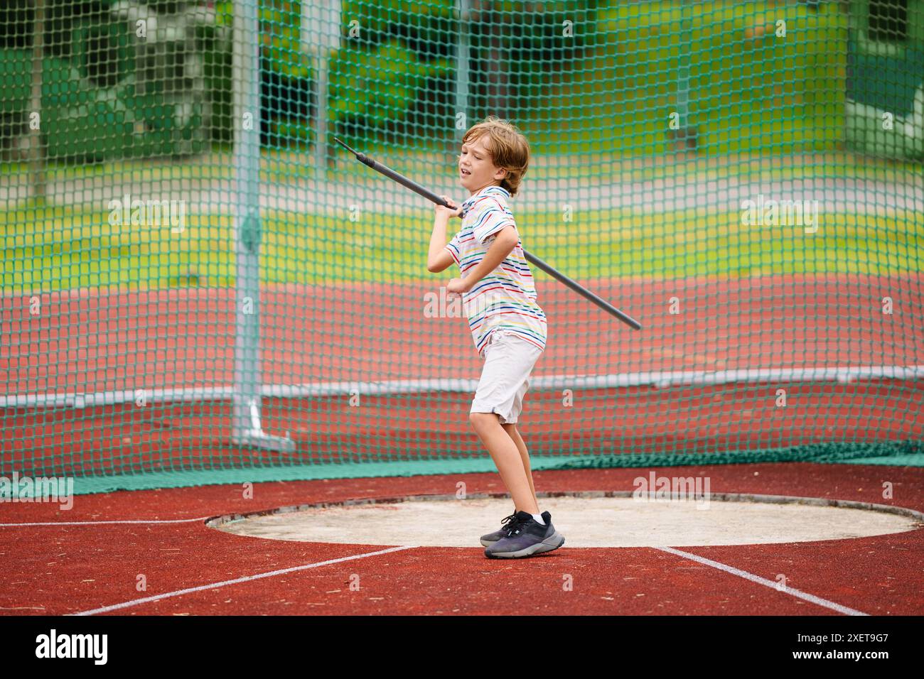Javelin throw competition for kids. Athletics club training in school ...