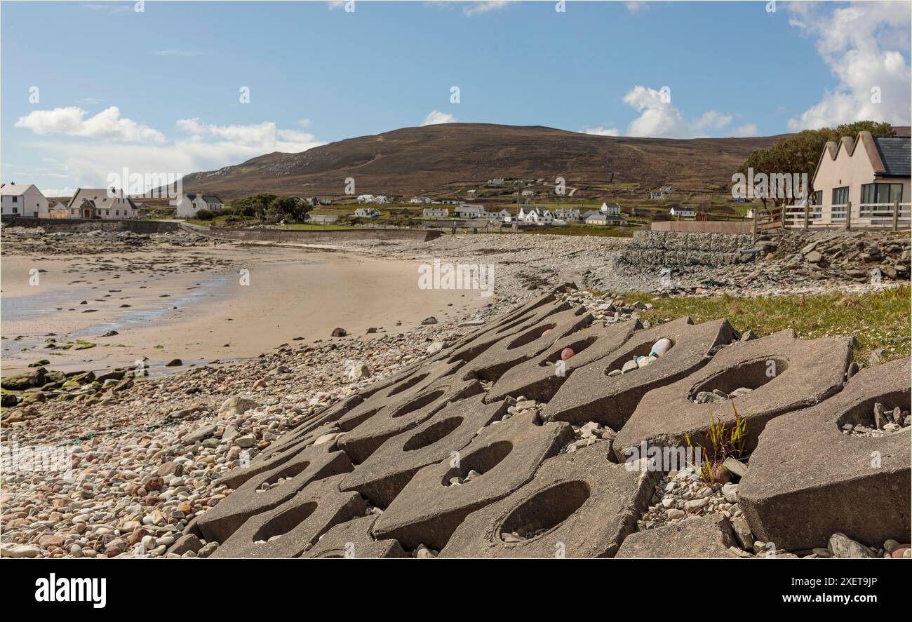 Unusual linked break water made of concrete leading onto a harbour ...