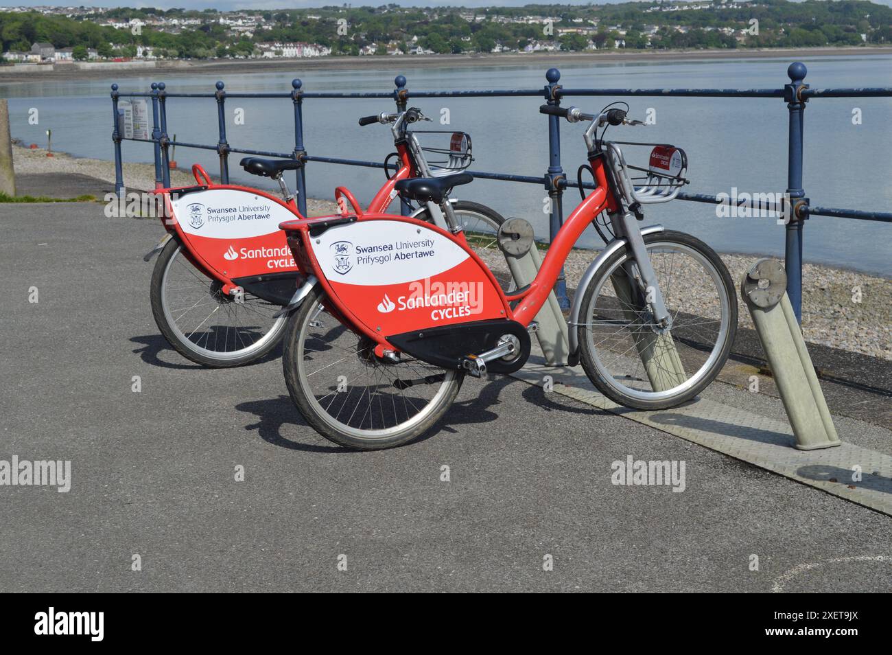 Two Santander Cycles parked up by the promenade railings in Mumbles ...