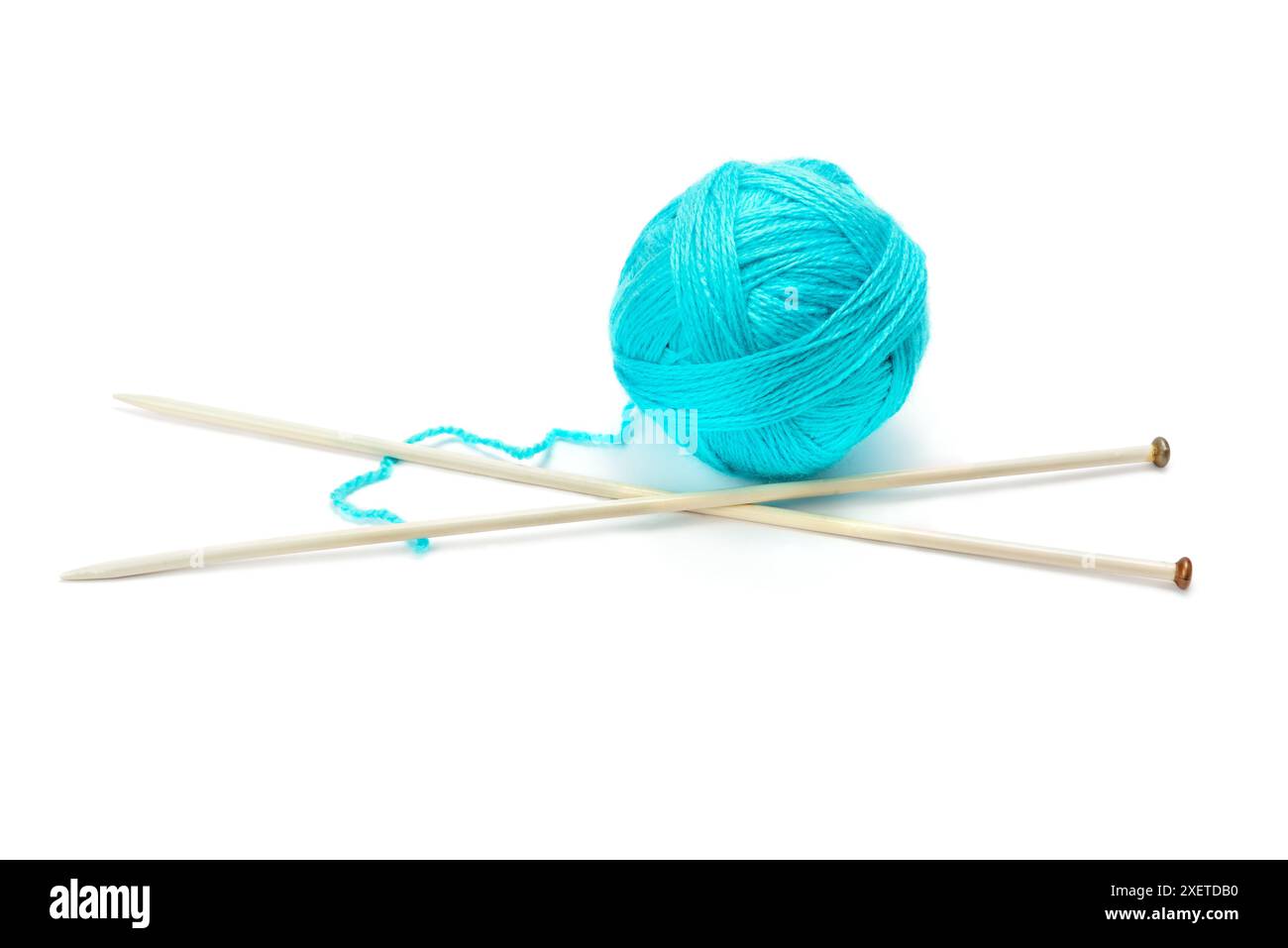 Ball of woolen thread and knitting needles isolated on white background ...