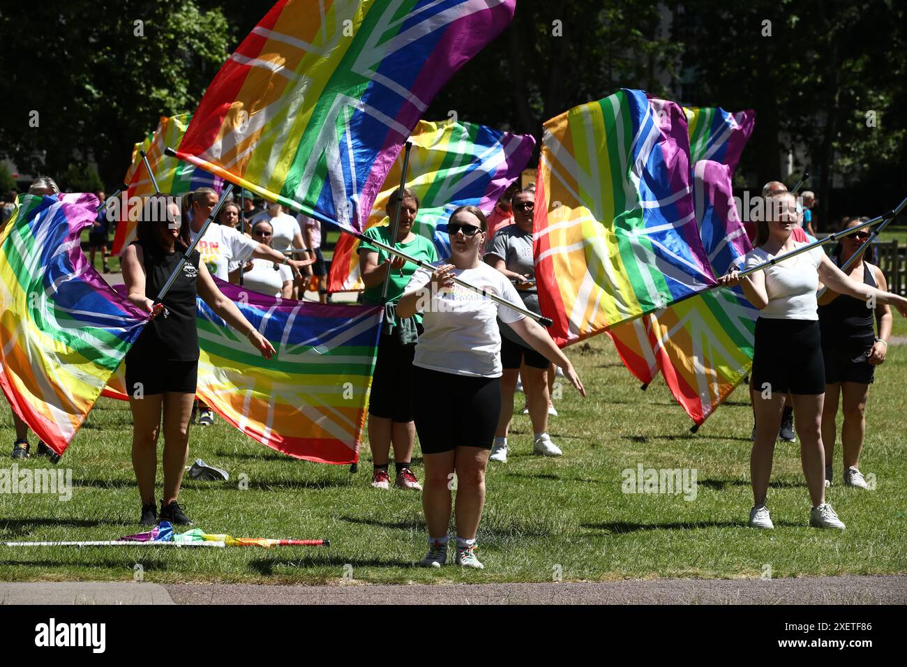 London, UK. 29th June, 2024. Members of the UK Pride Colour Guard ...
