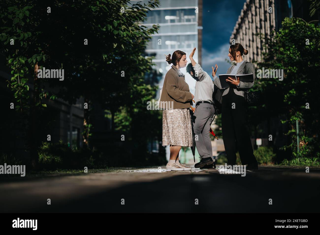 Male business person arguing with his female coworkers and leaving in ...