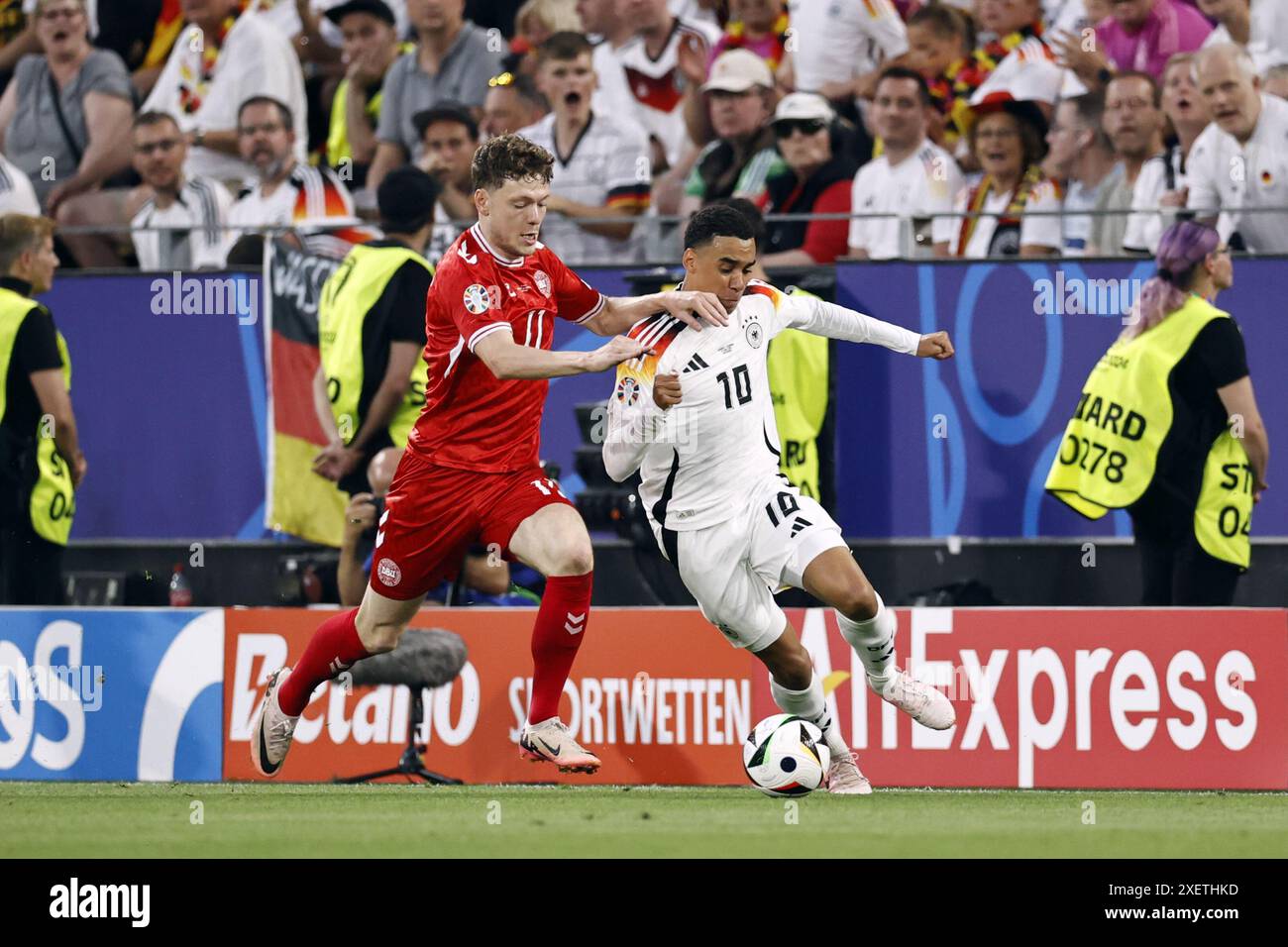 Dortmund - (l-r) Andreas Skov Olsen of Denmark, Jamal Musiala of ...