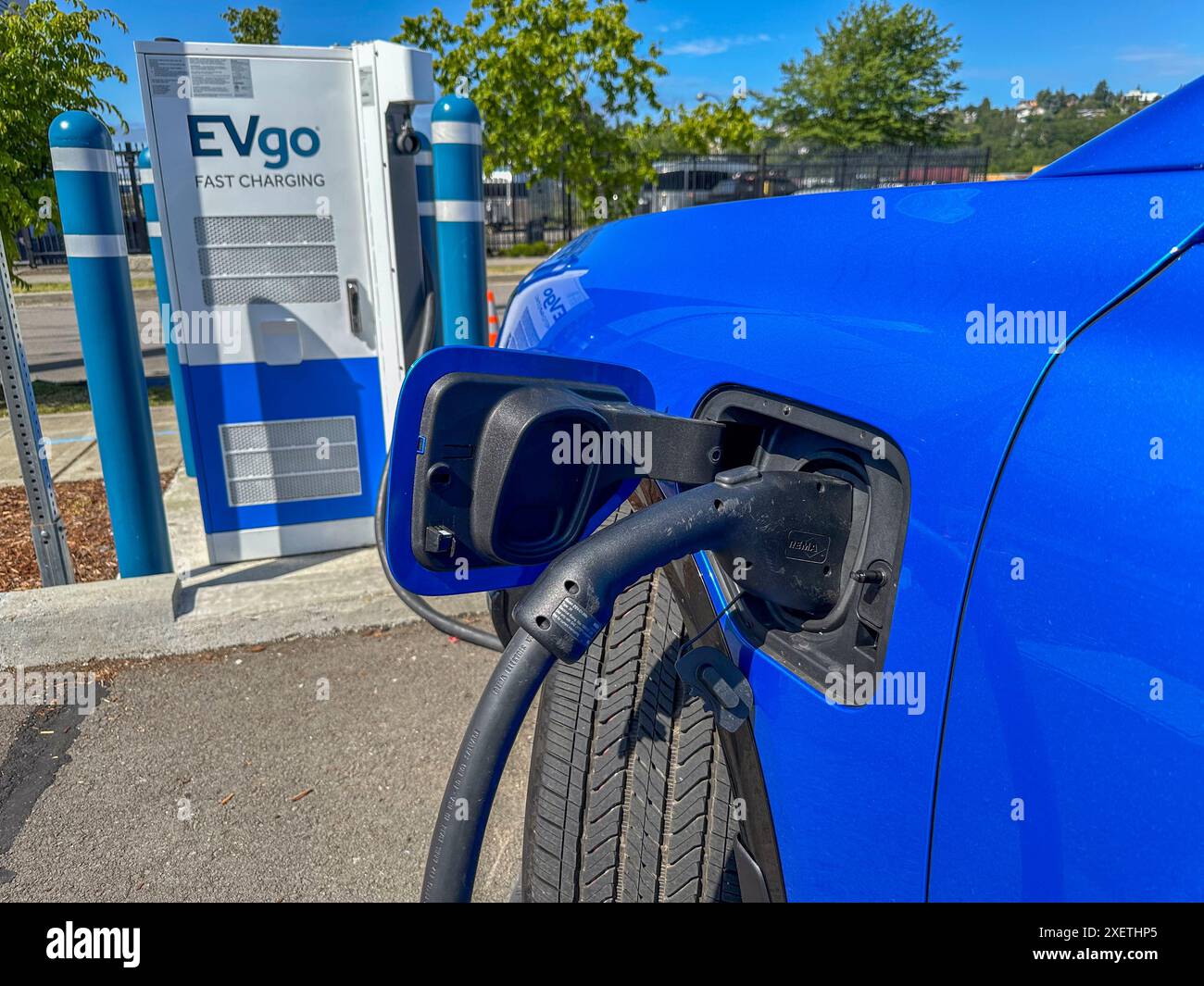 A newly installed electric vehicle (EV) charging station in the ...