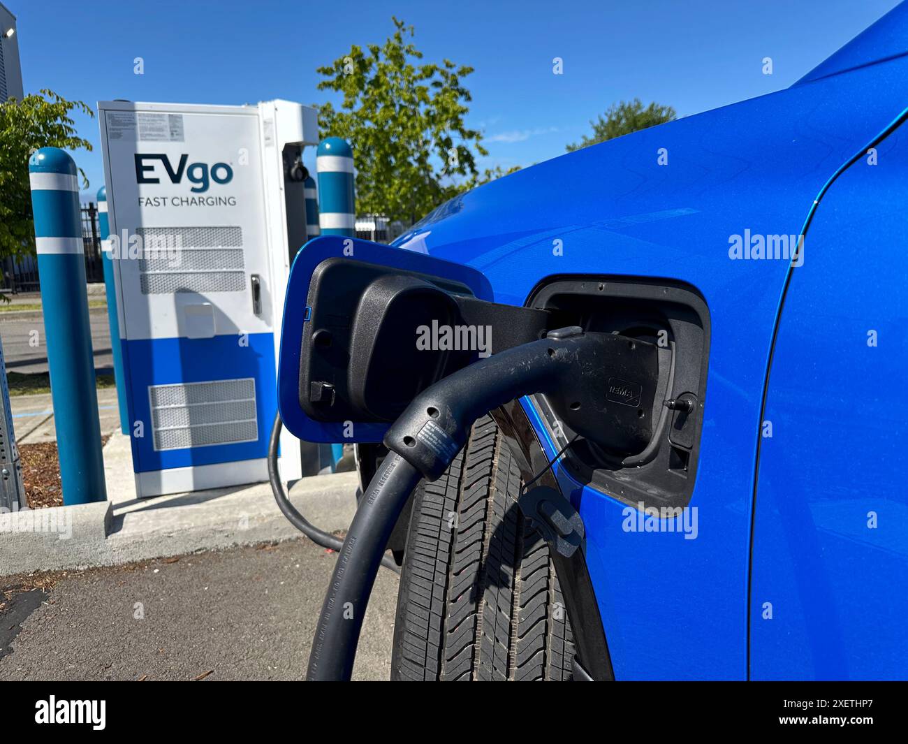 A newly installed electric vehicle (EV) charging station in the ...