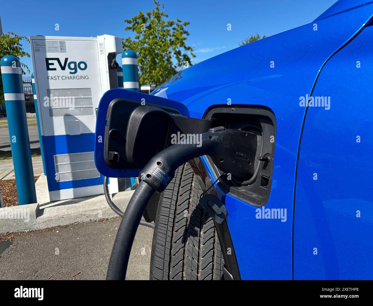 A newly installed electric vehicle (EV) charging station in the ...
