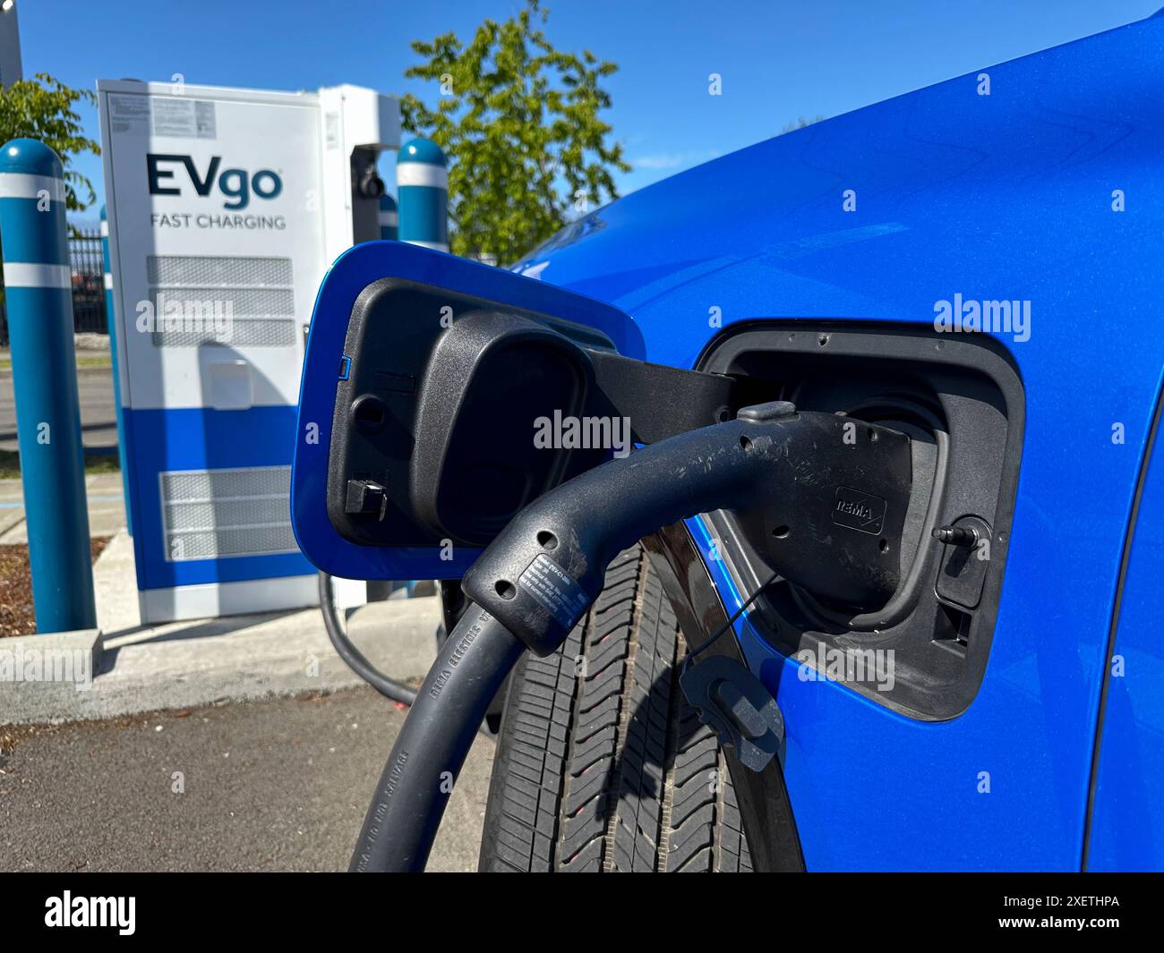 A newly installed electric vehicle (EV) charging station in the ...