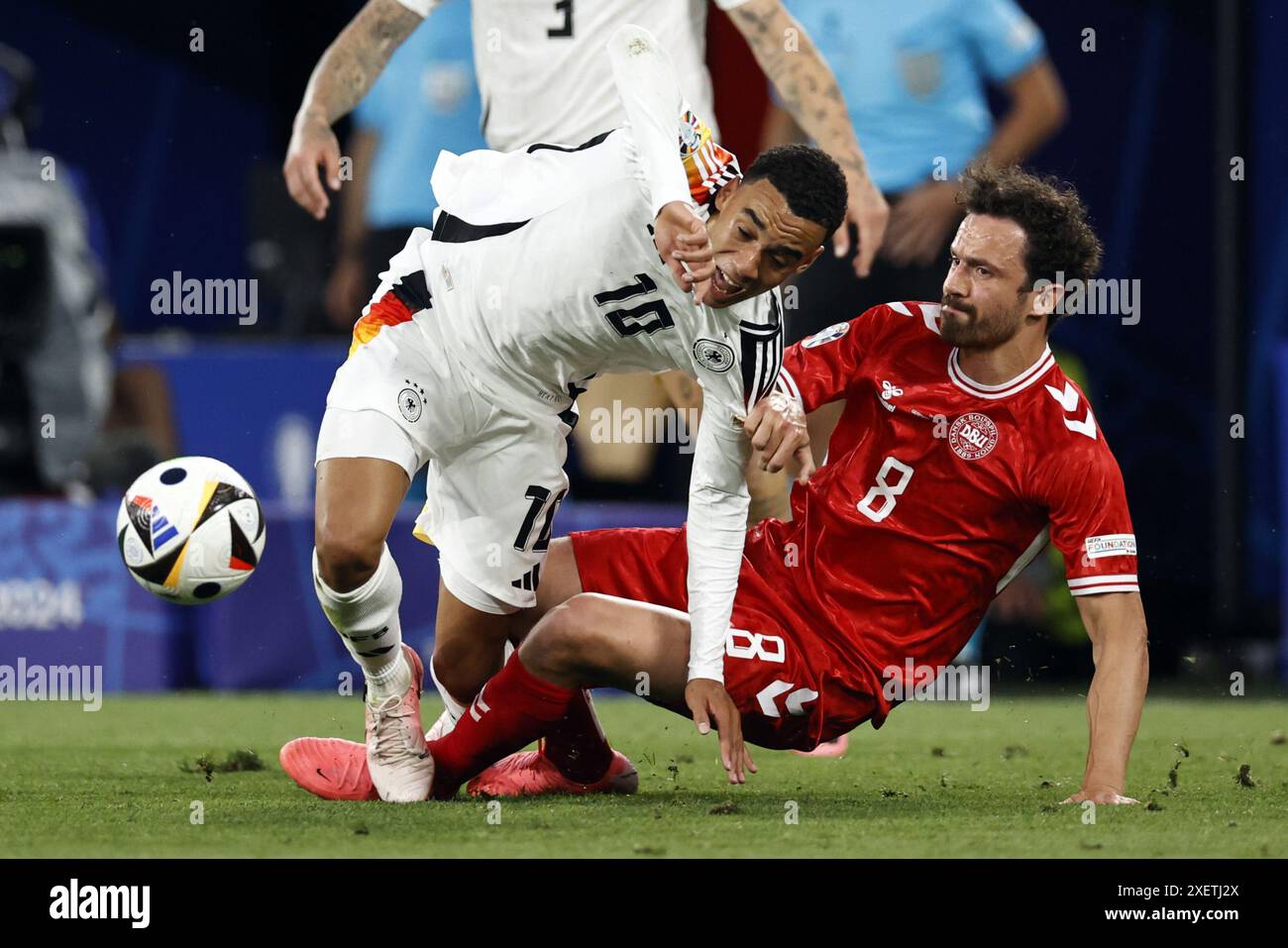 Dortmund - (l-r) Jamal Musiala of Germany, Thomas Delaney of Denmark ...