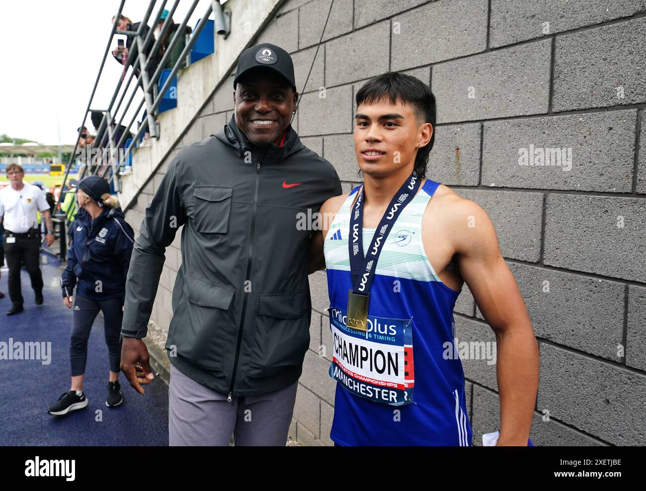 Carl Lewis and Louie Hinchliffe after winning the Men's 100m final ...