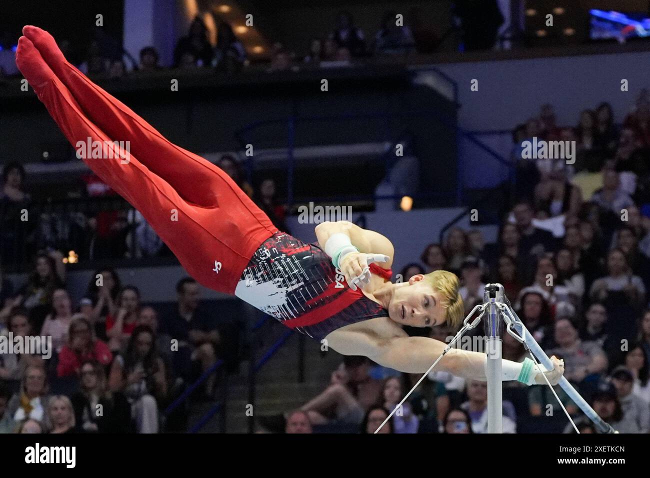 Shane Wiskus competes on the horizontal bar at the United States ...