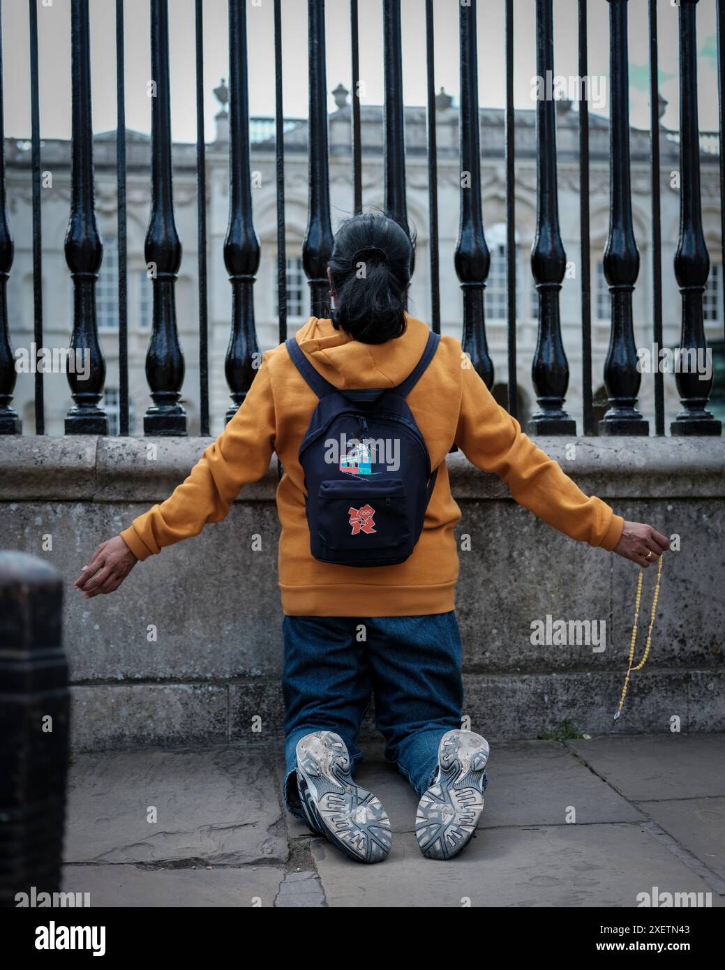 Praying in the street hi-res stock photography and images - Alamy