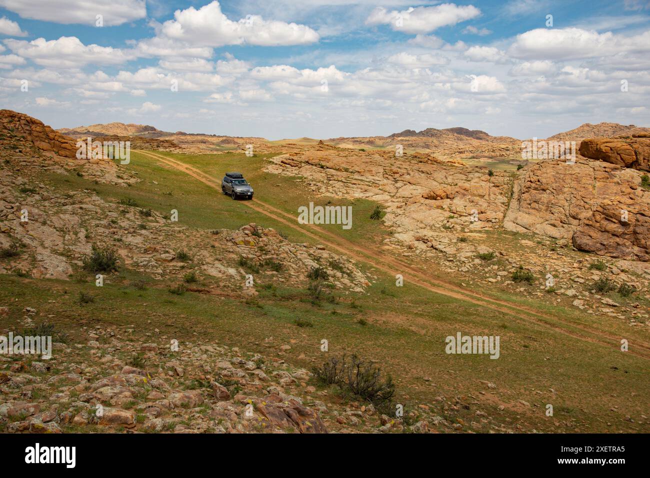 Off-road through the Mongolian steppe, Baga Gazriin Chuluu National ...