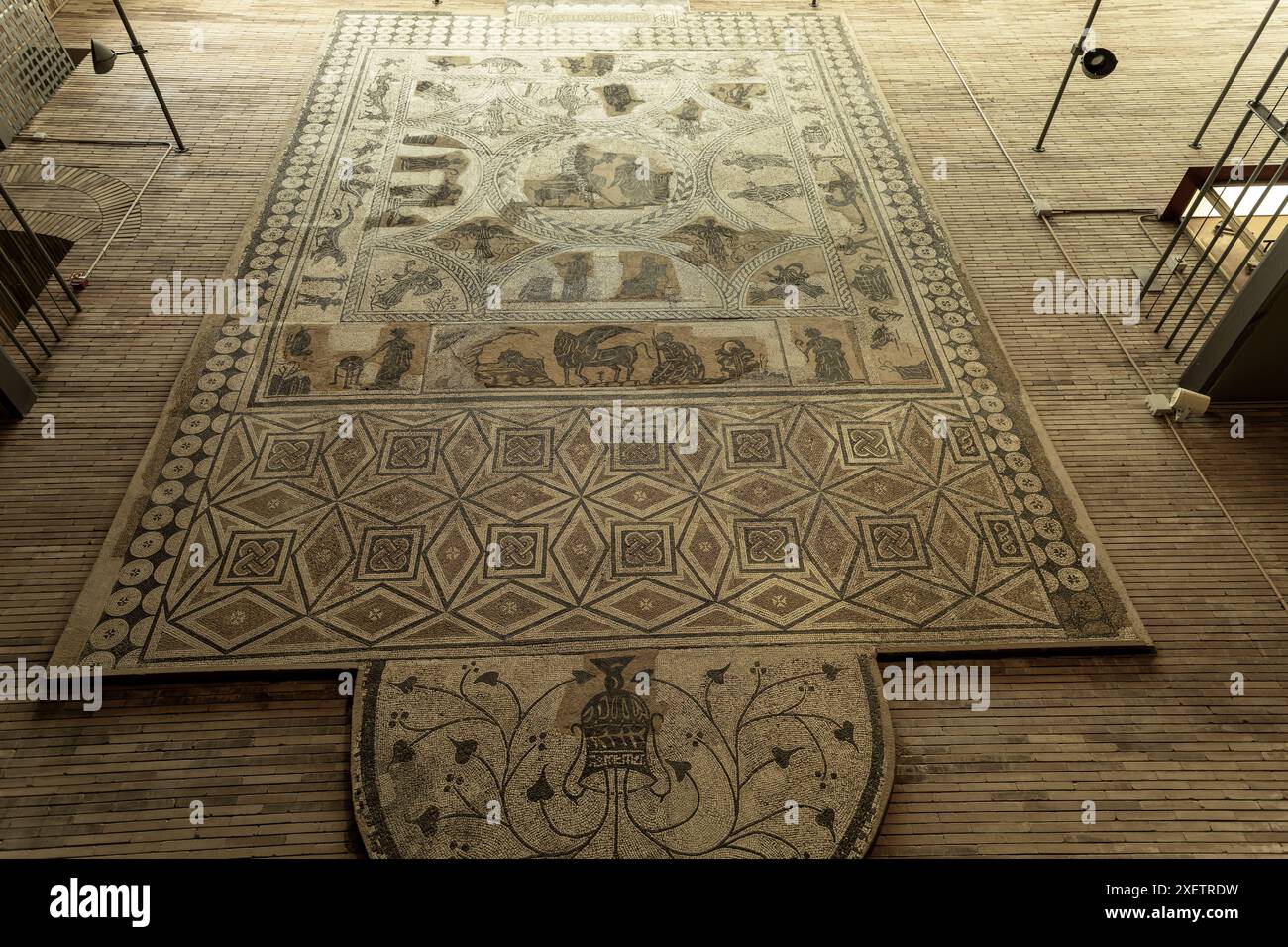 A large, detailed Roman mosaic exhibited at the Merida Museum ...