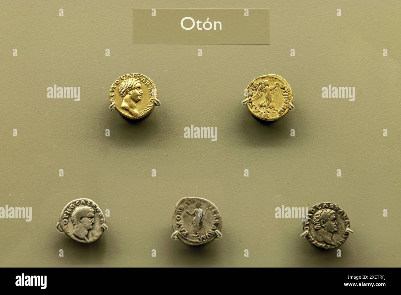 Display of ancient Roman gold and silver coins featuring Emperor Otho ...