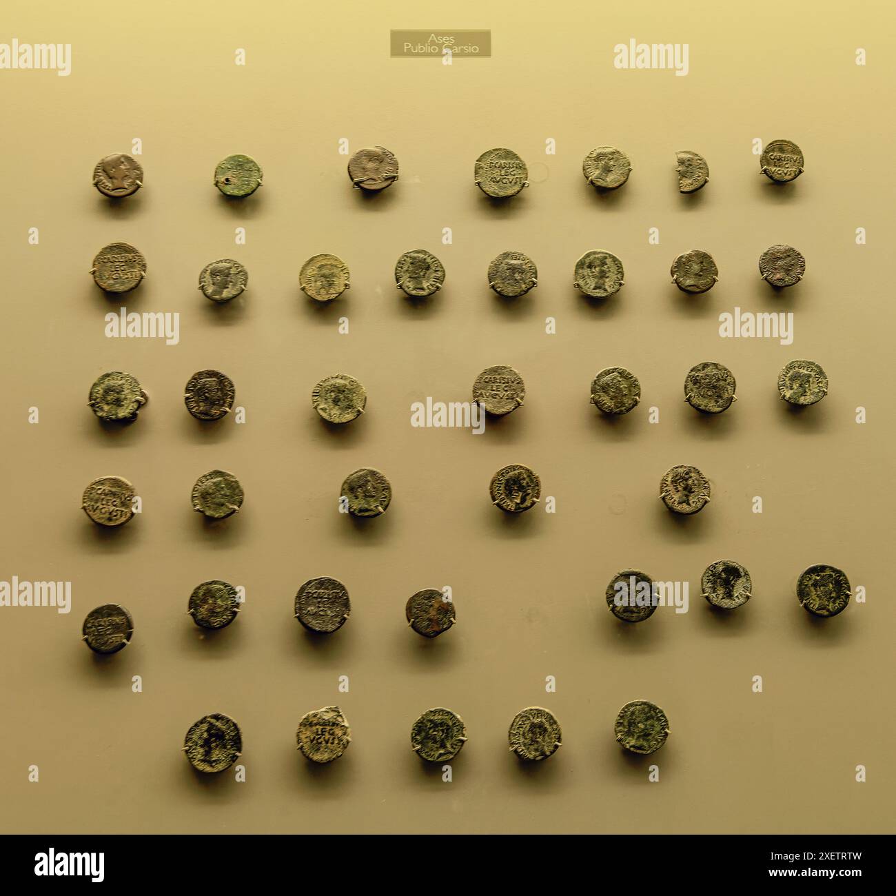 A display of ancient Roman coins, known as Ases, minted during the era ...