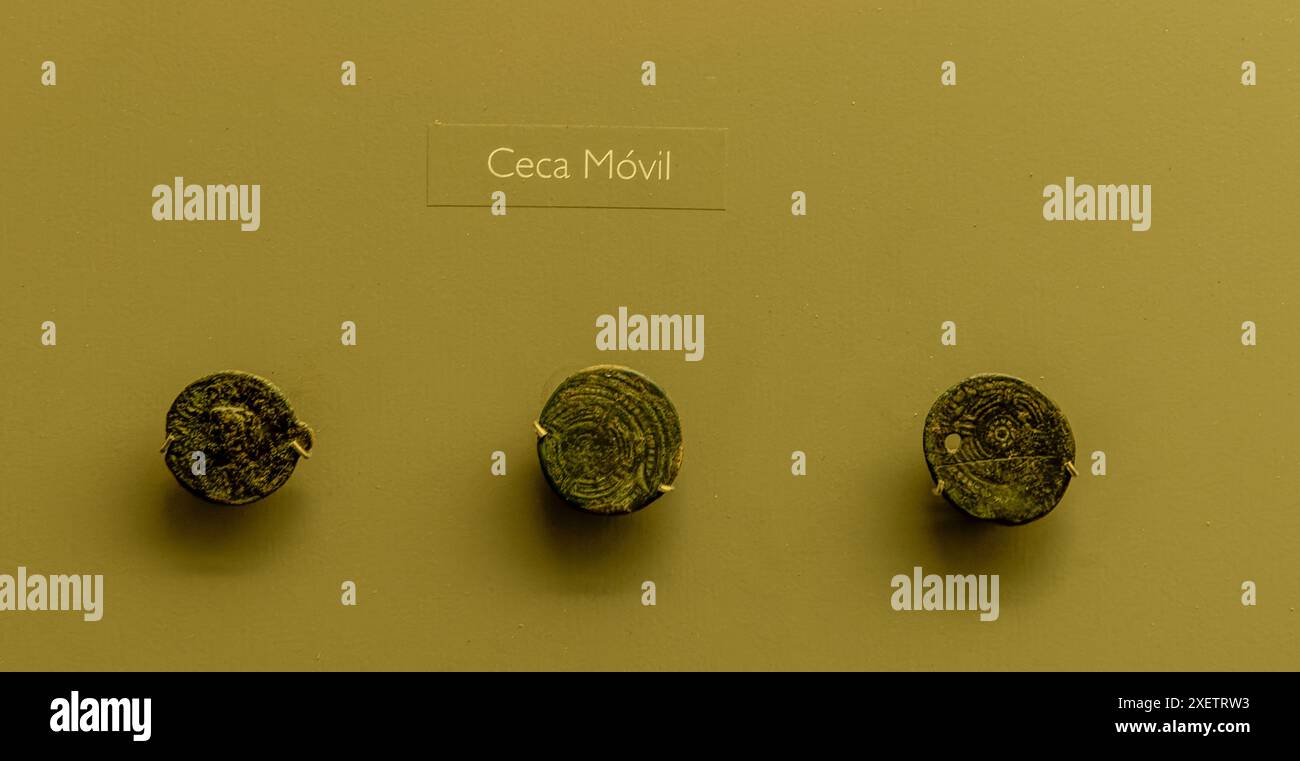 Exhibit of ancient coins from a mobile mint, showcasing intricate ... Exhibit of ancient coins from a mobile mint, showcasing intricate ...