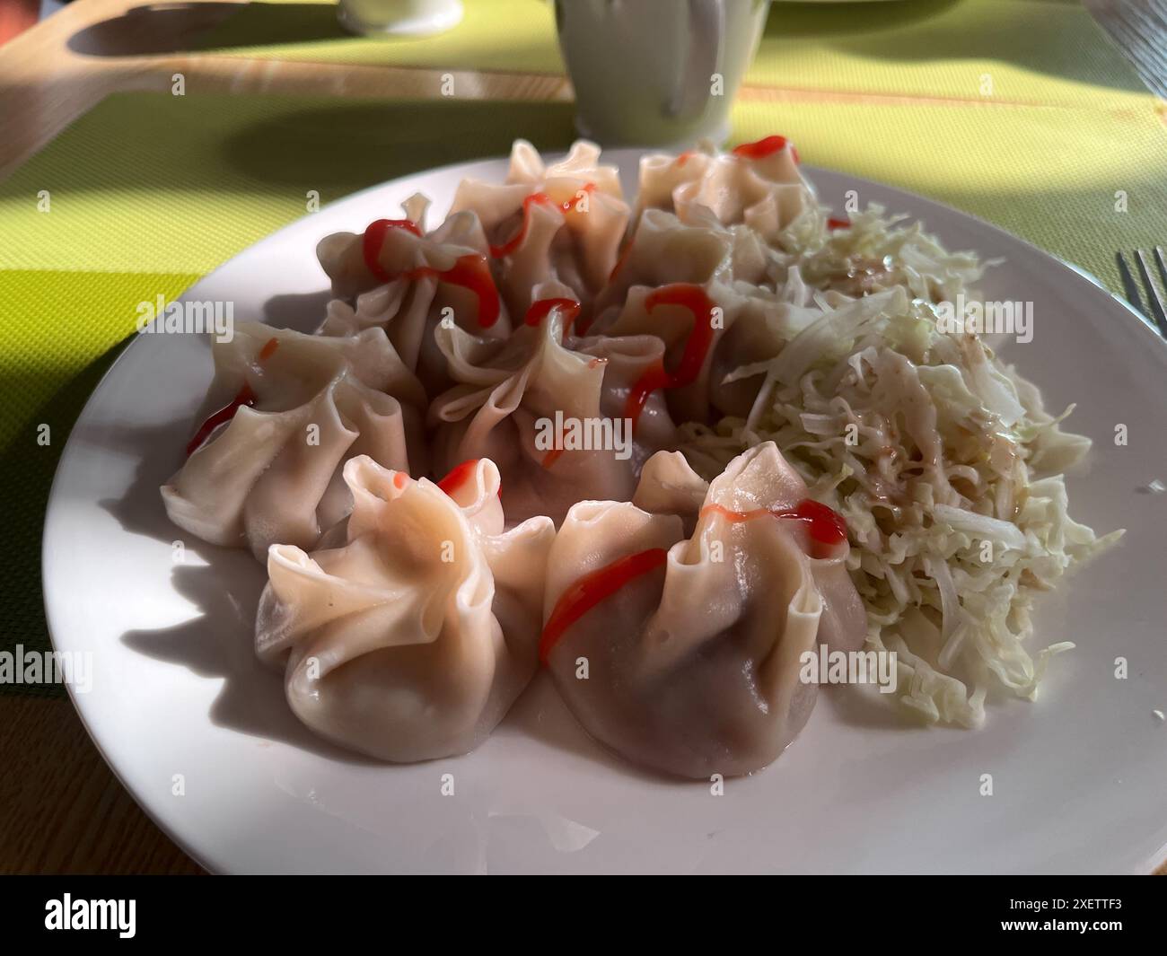 Buuz, a typical Mongolian dish, served in a yurt in the middle of the ...