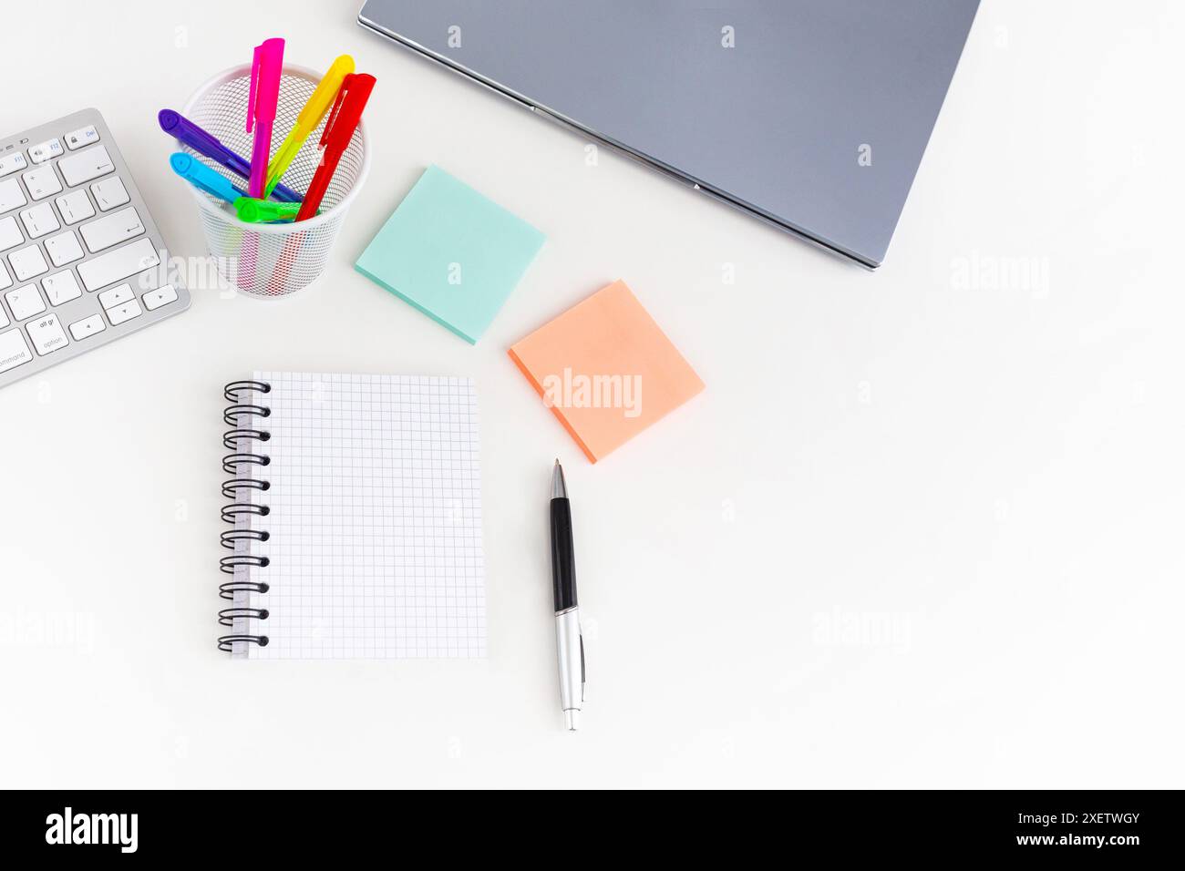 Office desk table with supplies, sticky notes and coloured pens. Top ...